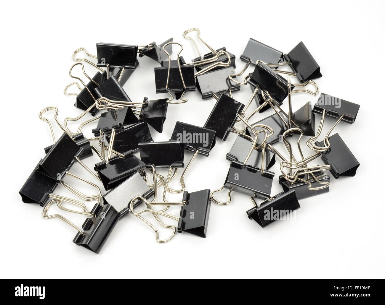 A black binder clip against a white background Stock Photo - Alamy