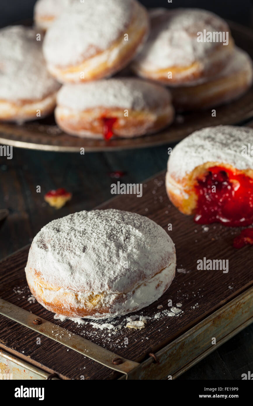 Homemade Sugary Paczki Donut with Cherry Filling Stock Photo - Alamy