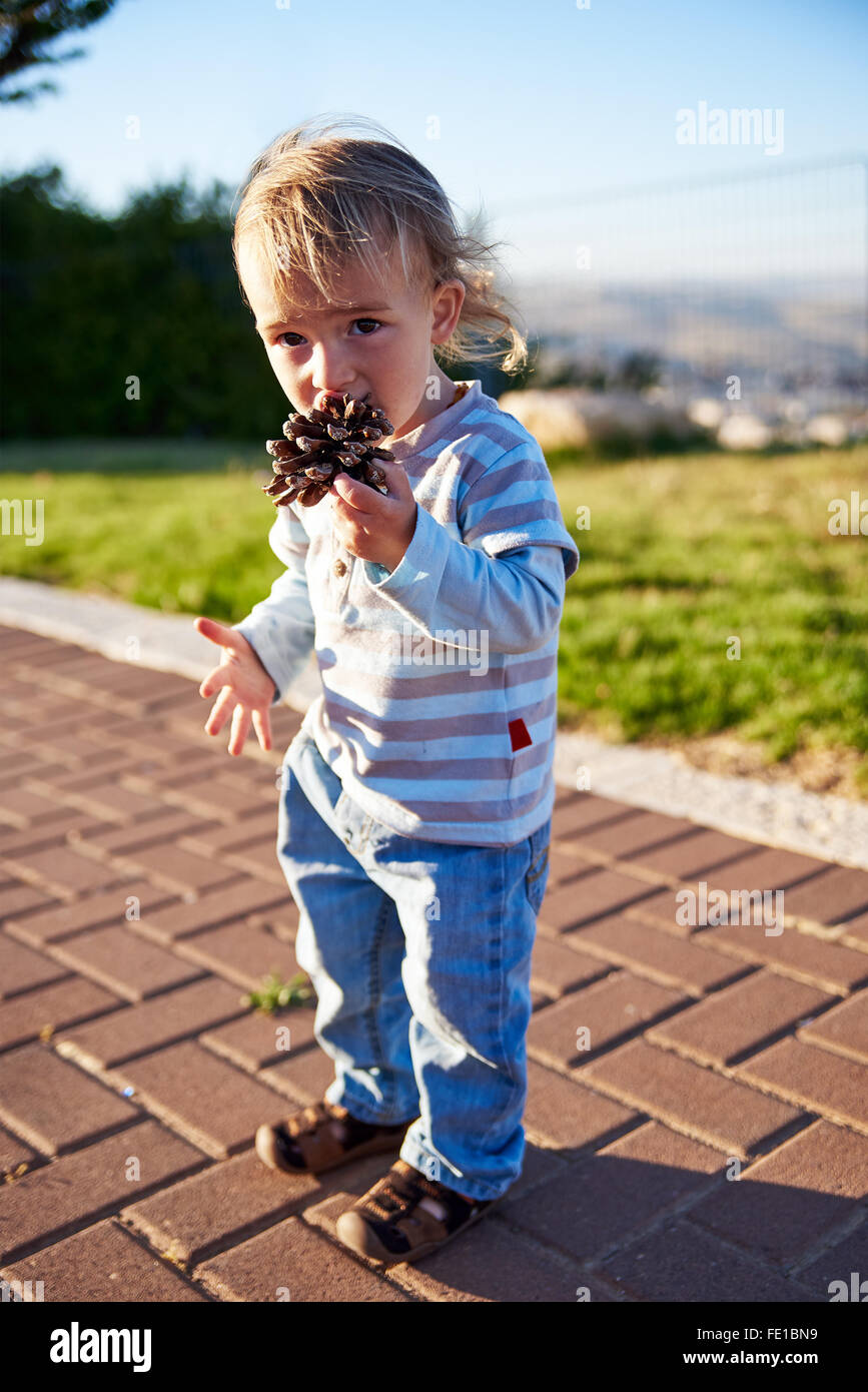 Cute baby boy child playing in play area. Toddler at the playground ...