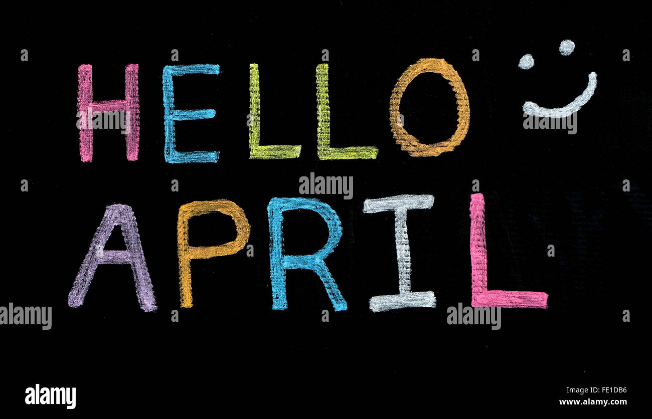 Hello April written on blackboard Stock Photo - Alamy