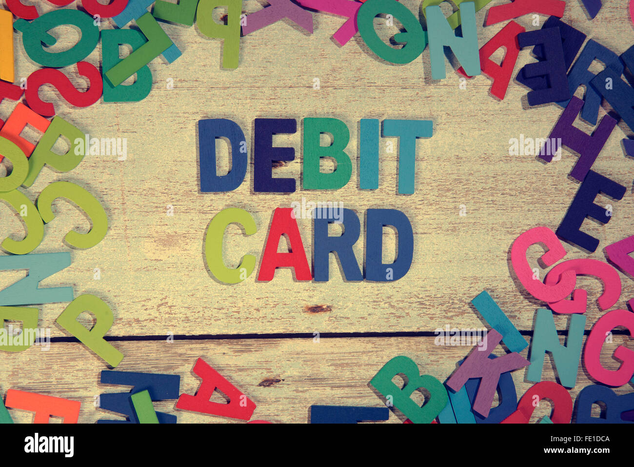 debit card word block concept photo on plank wood Stock Photo - Alamy