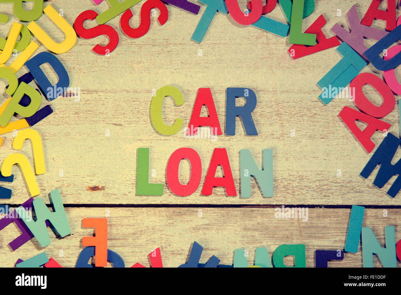 car loan word block concept photo on plank wood Stock Photo - Alamy