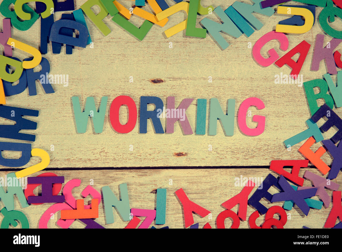 working word block concept photo on plank wood Stock Photo - Alamy