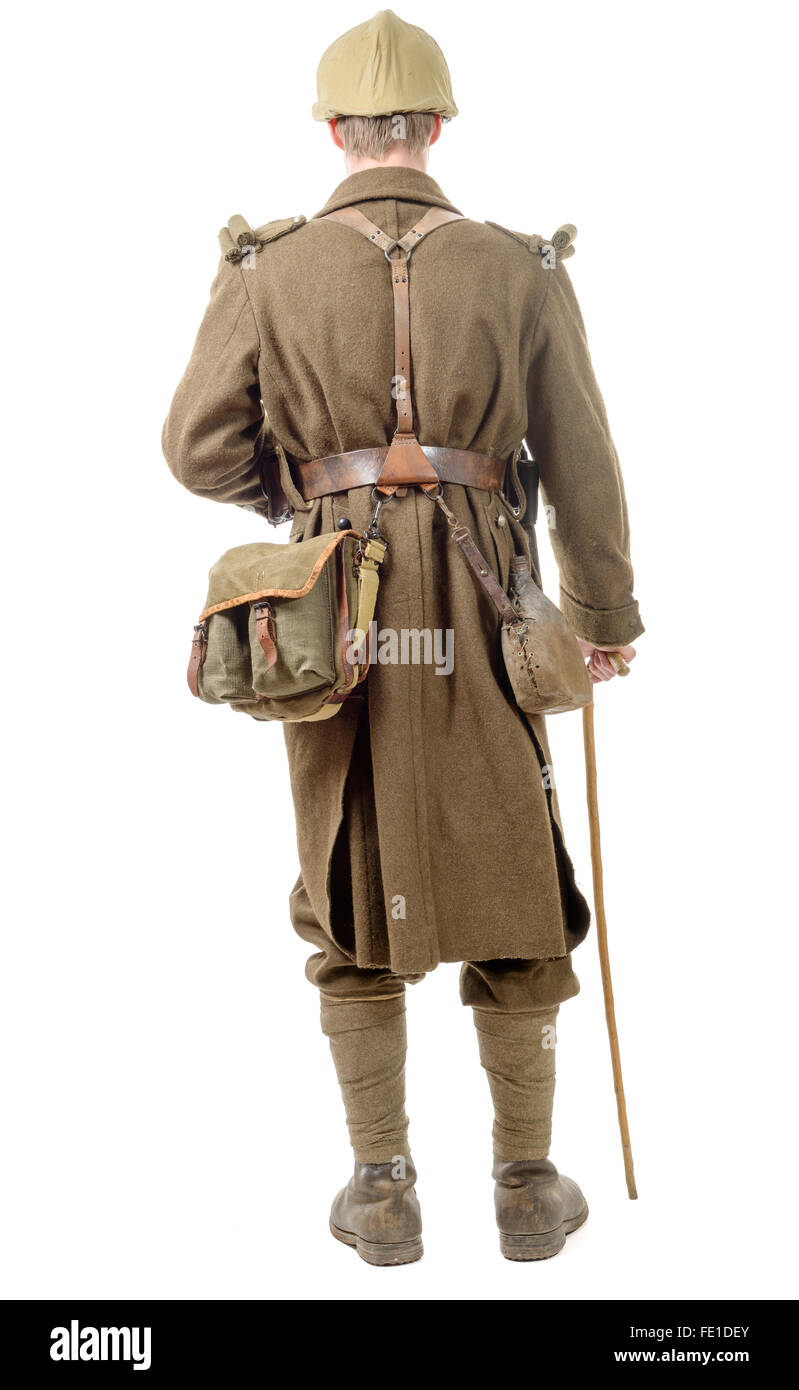 a 40s french soldier with a flag, back view, isolated on a white ...
