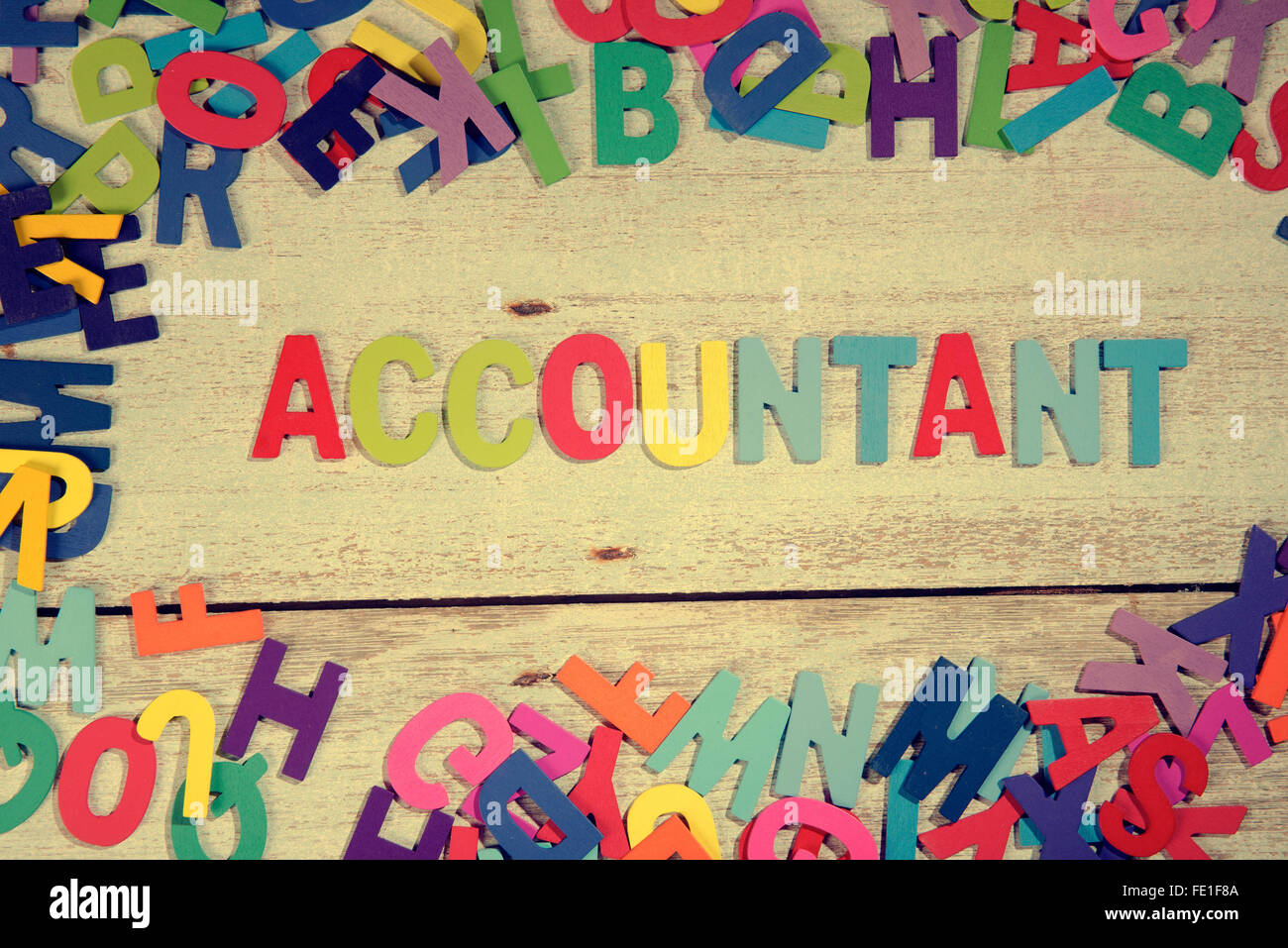 accountant word block concept photo on plank wood Stock Photo - Alamy