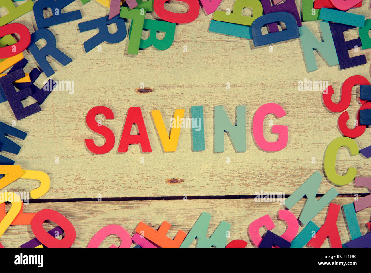 savings word block concept photo on plank wood Stock Photo - Alamy