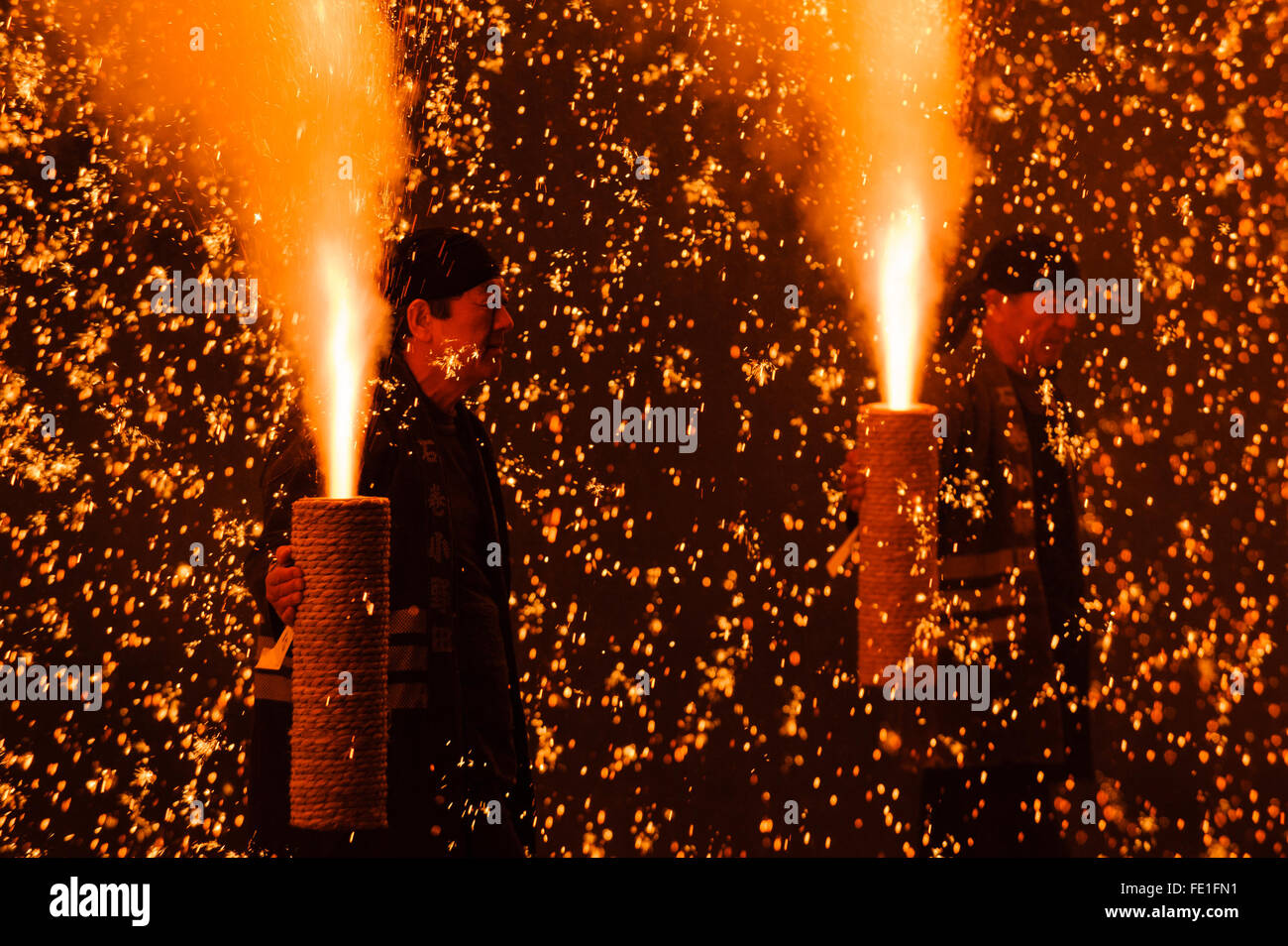 Gifu, Japan. 3rd February, 2016. Men launch handheld fireworks known as ...
