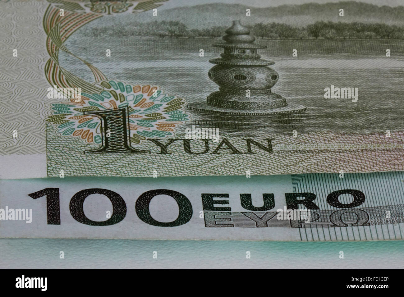 ILLUSTRATION - A Renminbi note lies on a 100 Euro note. The photo was ...