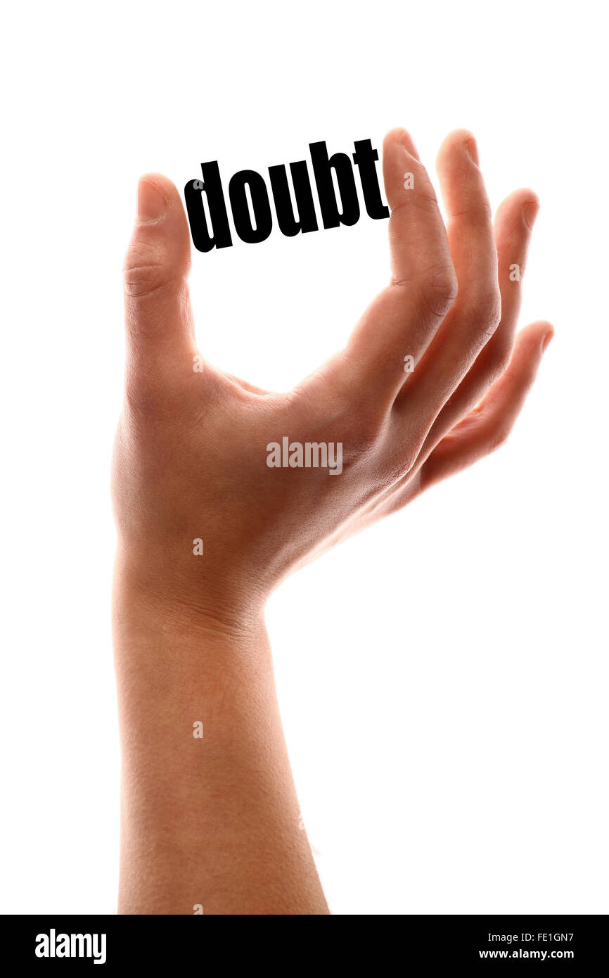 Color vertical shot of a hand squeezing the word "doubt Stock Photo - Alamy