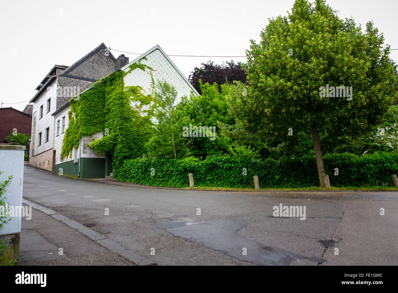 Colorful traditional German houses and empty road. Small European town ...