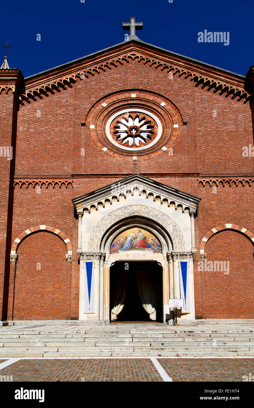 lombardy in the castellanza old church closed brick tower sidewalk ...