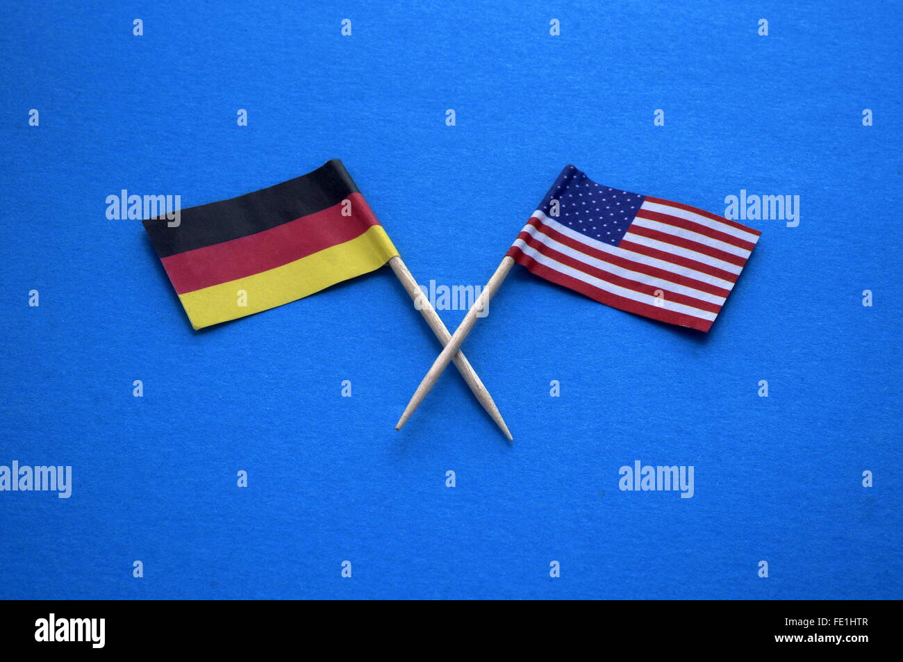 ILLUSTRATION - A little German and US flag intersect. The photo was ...