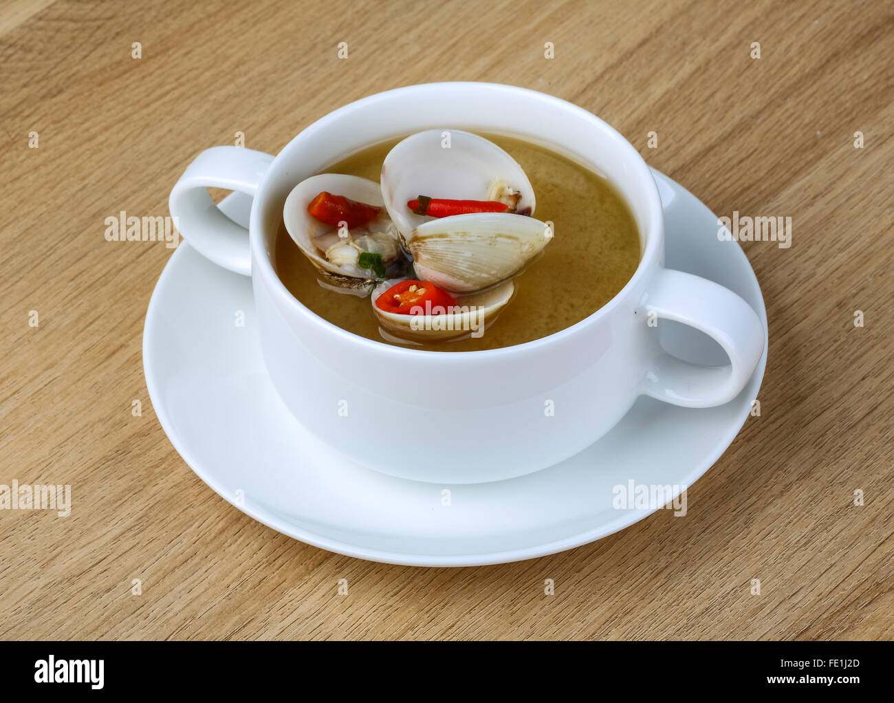 Asian traditional Shell soup on the wood background Stock Photo - Alamy