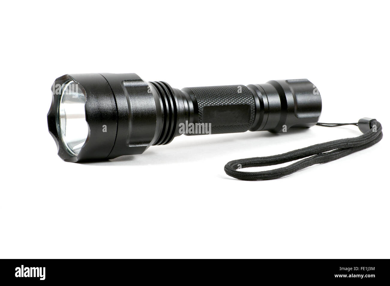 Isolated black flashlight side view with cord over white Stock Photo ...