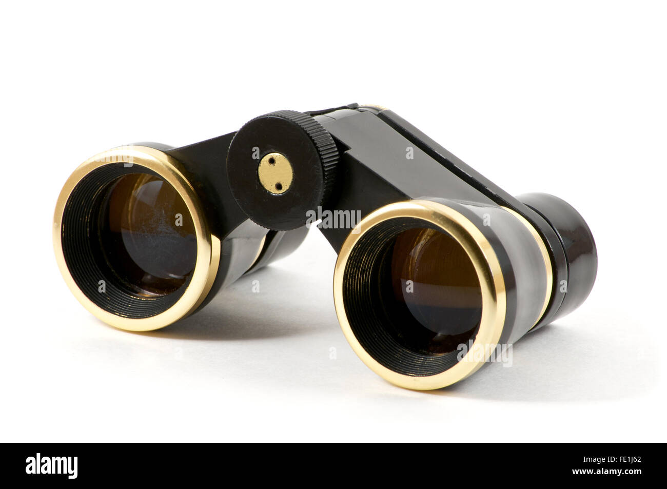 Isolated theater black binoculars with golden ring over white side view ...
