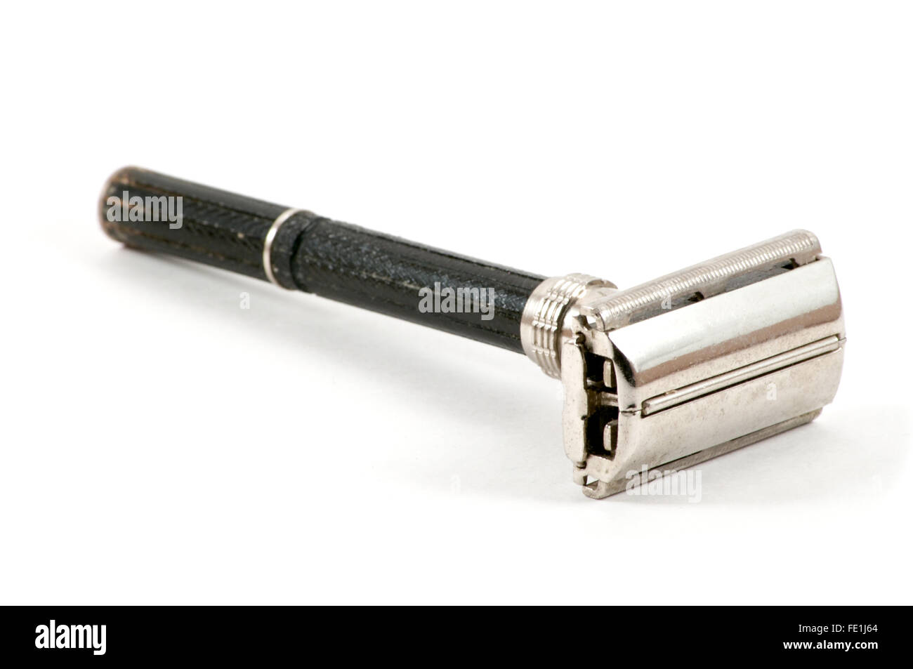 Isolated old razor with black handle over white Stock Photo - Alamy