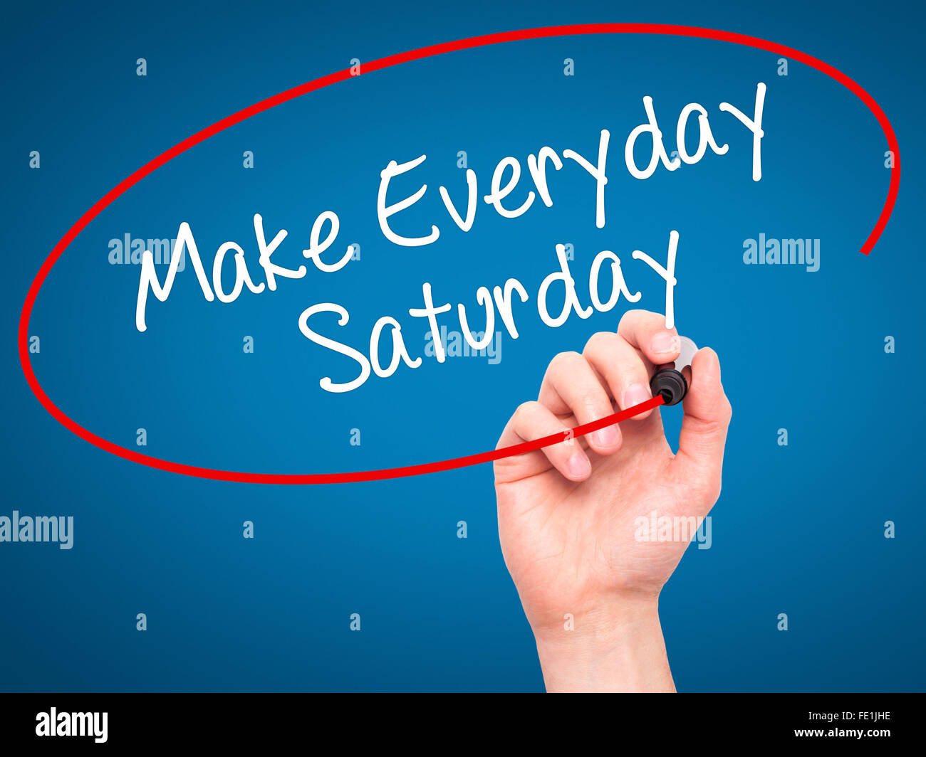 Man Hand writing Make Everyday Saturday with black marker on visual ...