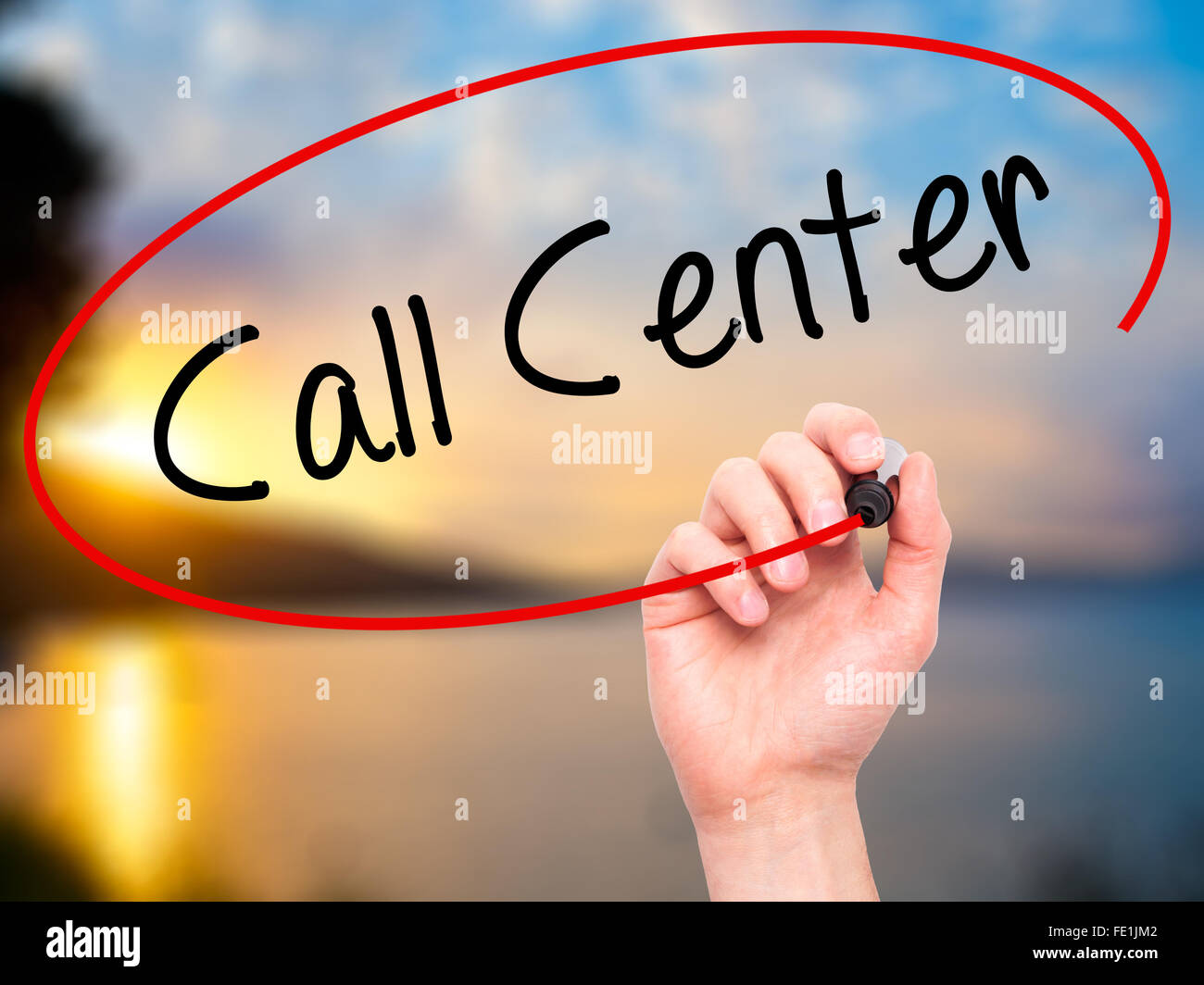 Man Hand writing Call Center with black marker on visual screen ...