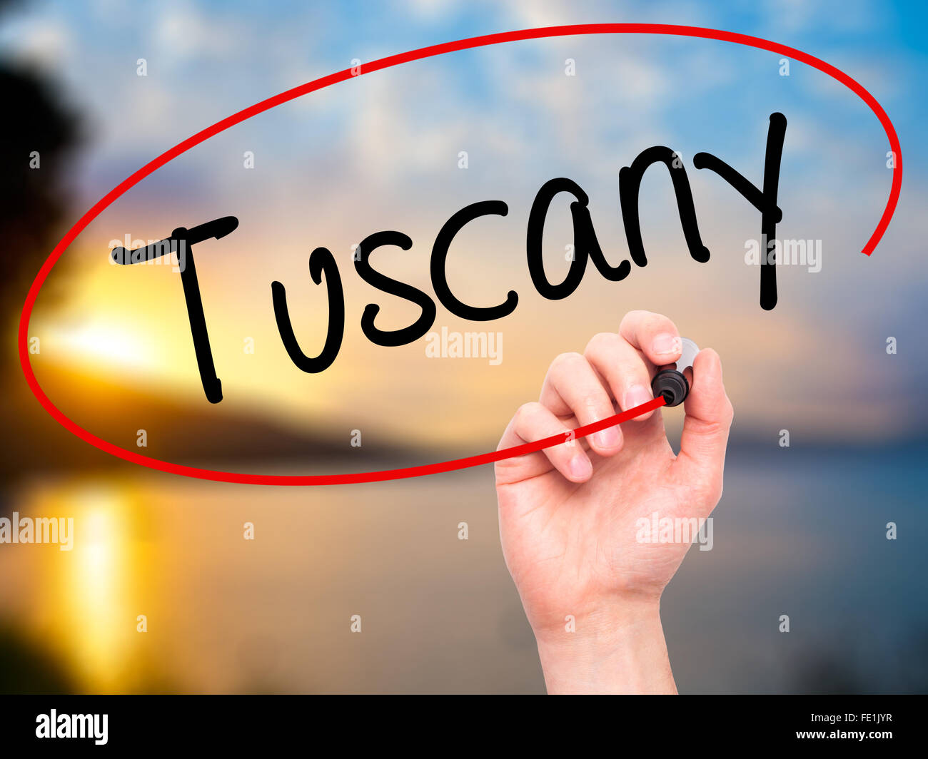 Man Hand writing Tuscany with black marker on visual screen. Isolated ...