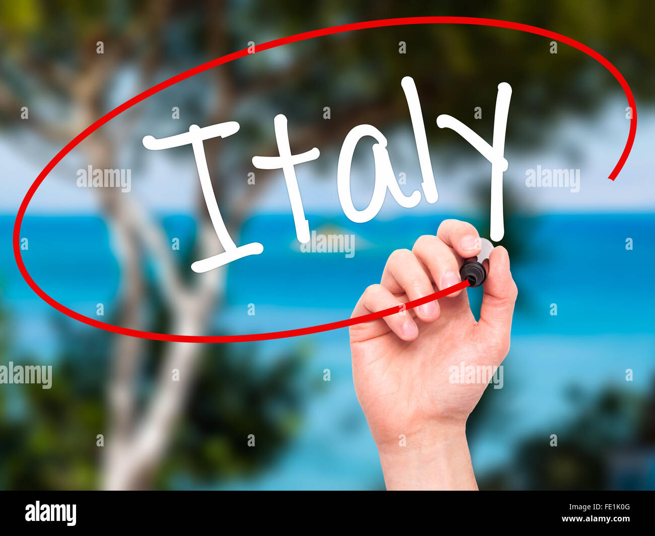 Man Hand writing Italy with black marker on visual screen. Isolated on ...