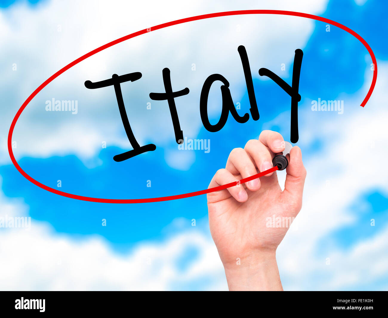 Man Hand writing Italy with black marker on visual screen. Isolated on ...
