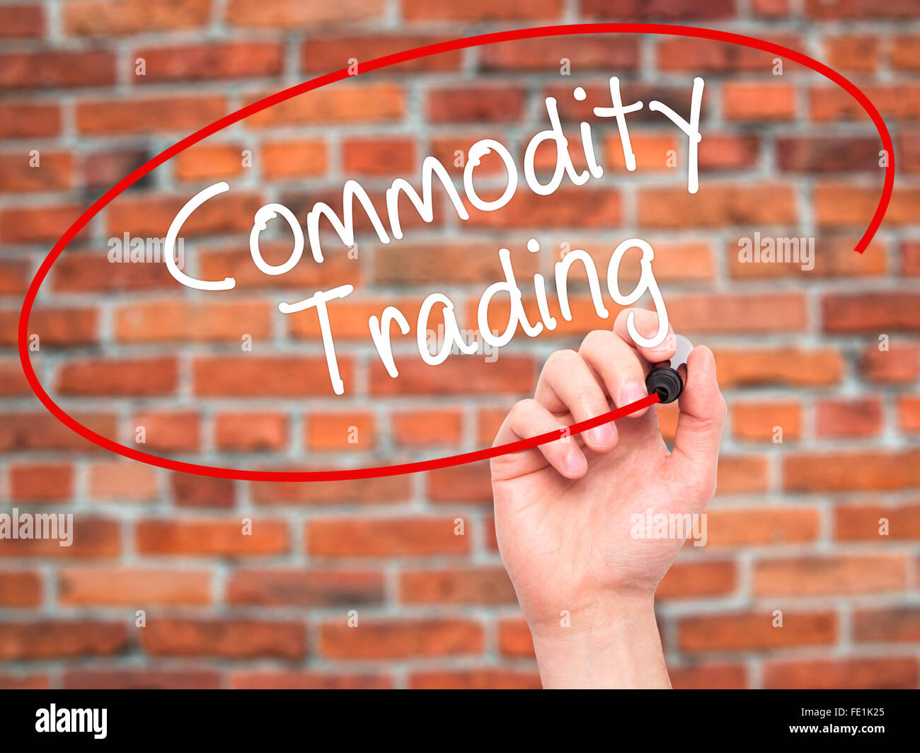 Man Hand writing Commodity Trading with black marker on visual screen ...