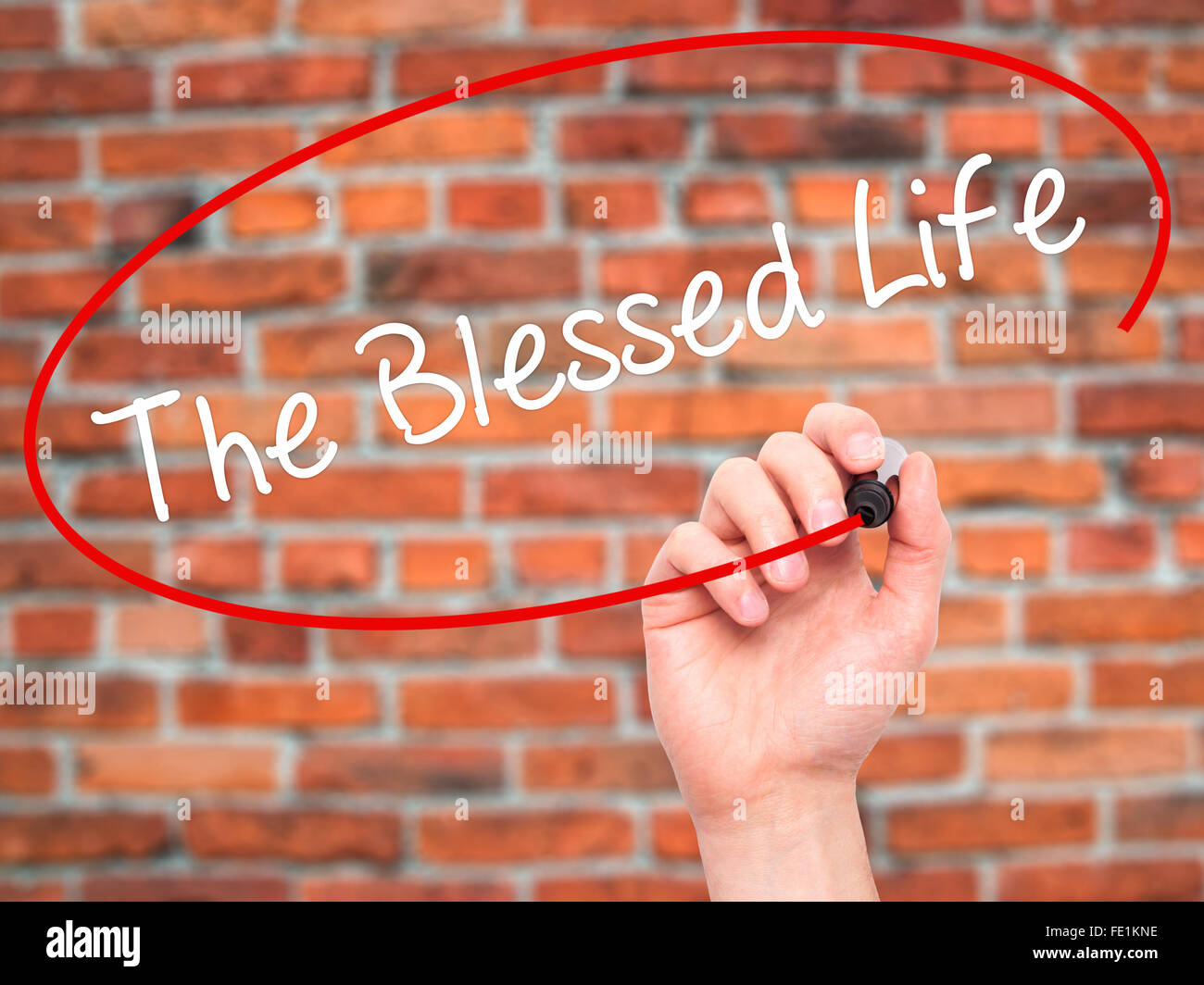 Man Hand writing The Blessed Life with black marker on visual screen ...