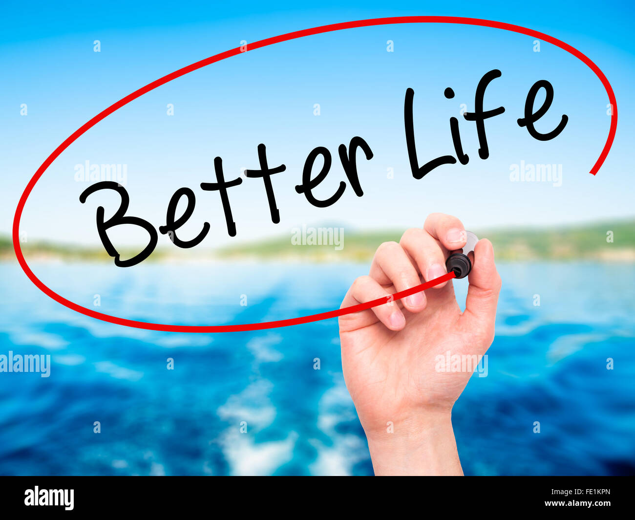 Man Hand writing Better Life with black marker on visual screen ...