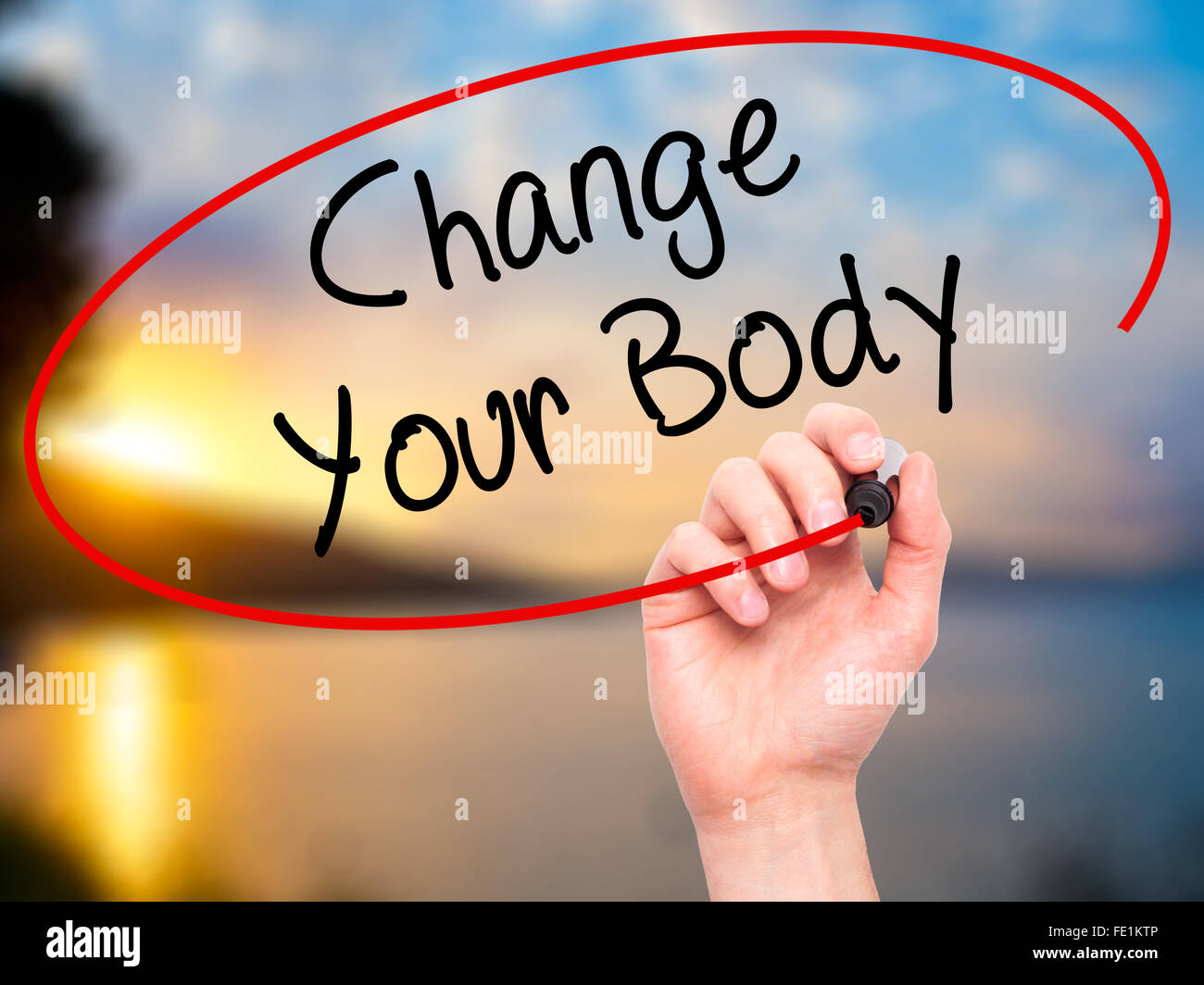 Man Hand writing Change Your Body with black marker on visual screen ...