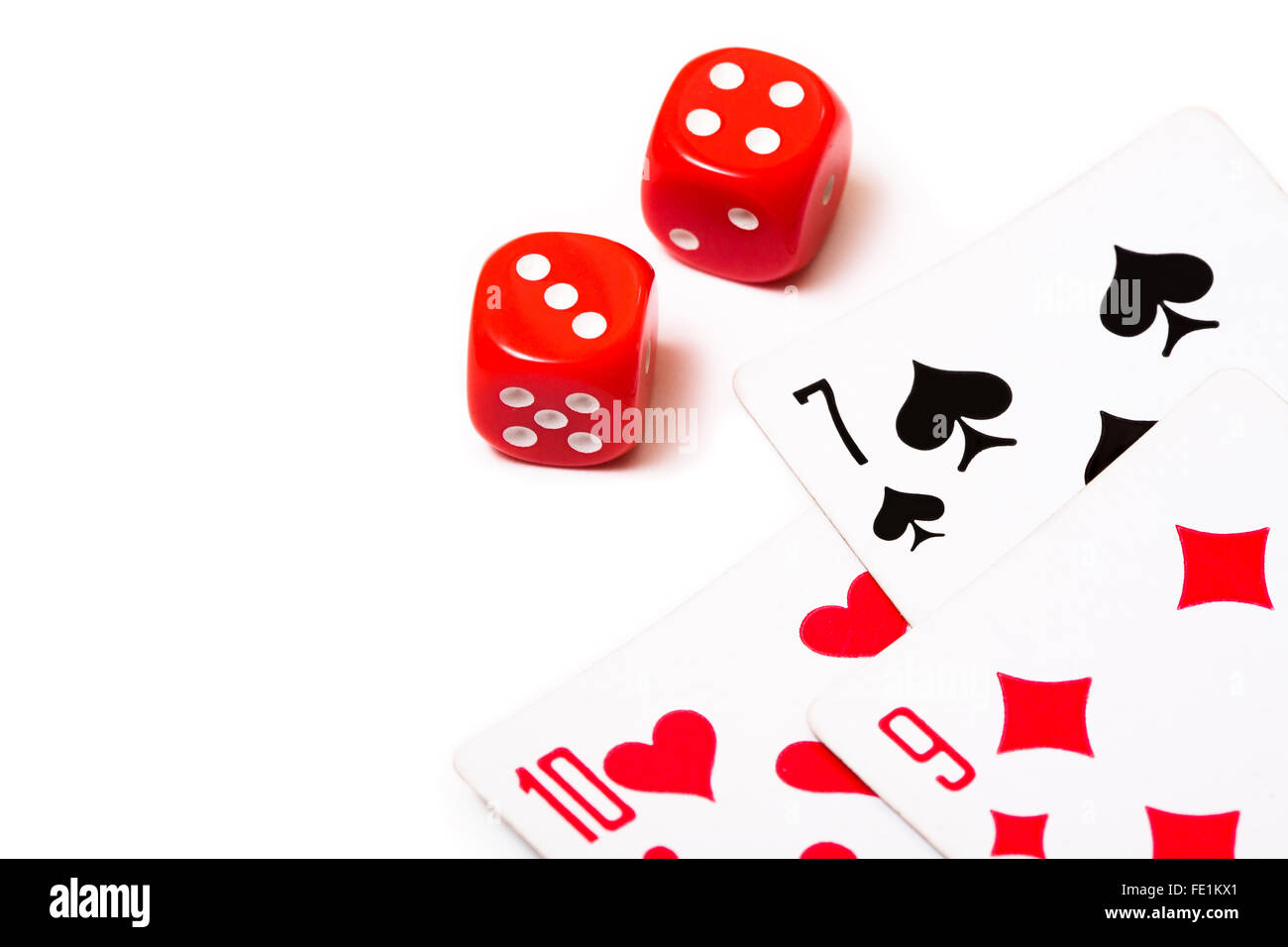 Playing cards and dice on a white background Stock Photo - Alamy