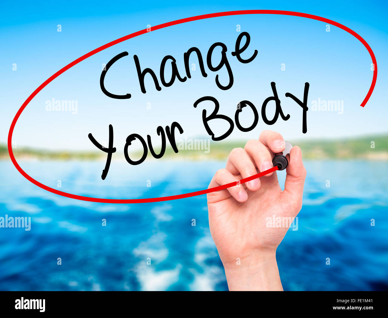 Man Hand writing Change Your Body with black marker on visual screen ...