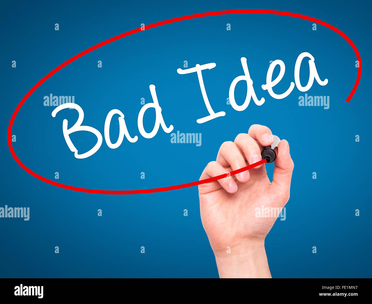Man Hand writing Bad Idea with black marker on visual screen. Isolated ...