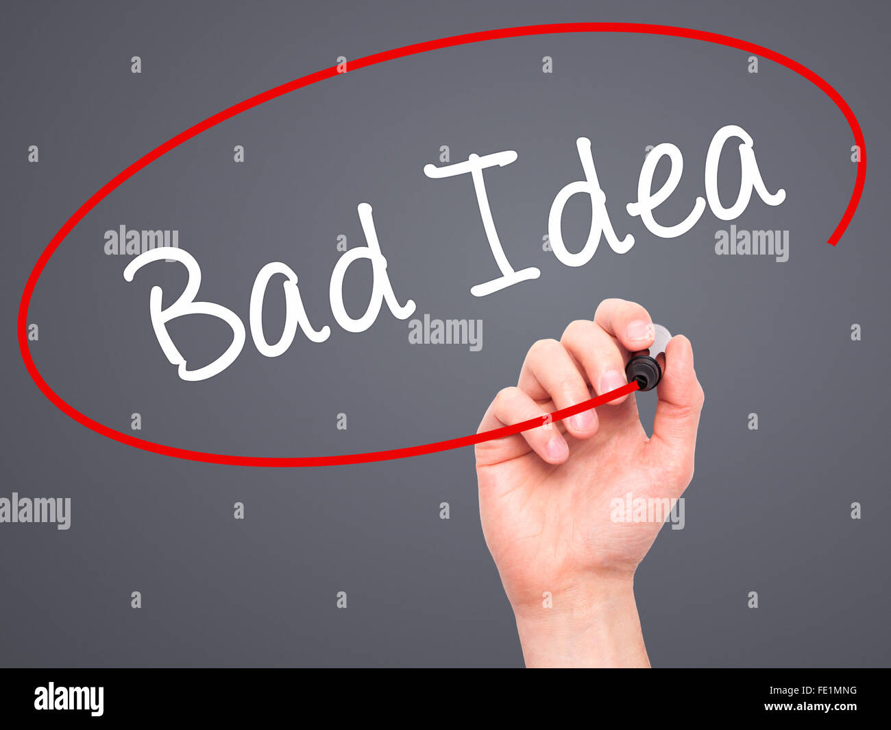 Man Hand writing Bad Idea with black marker on visual screen. Isolated ...