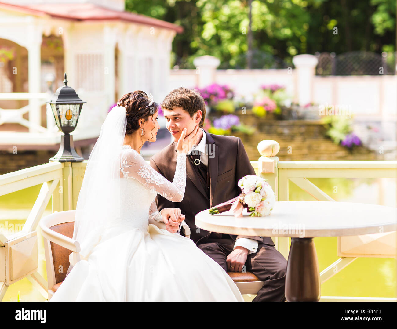 Just married couple embraced Stock Photo - Alamy