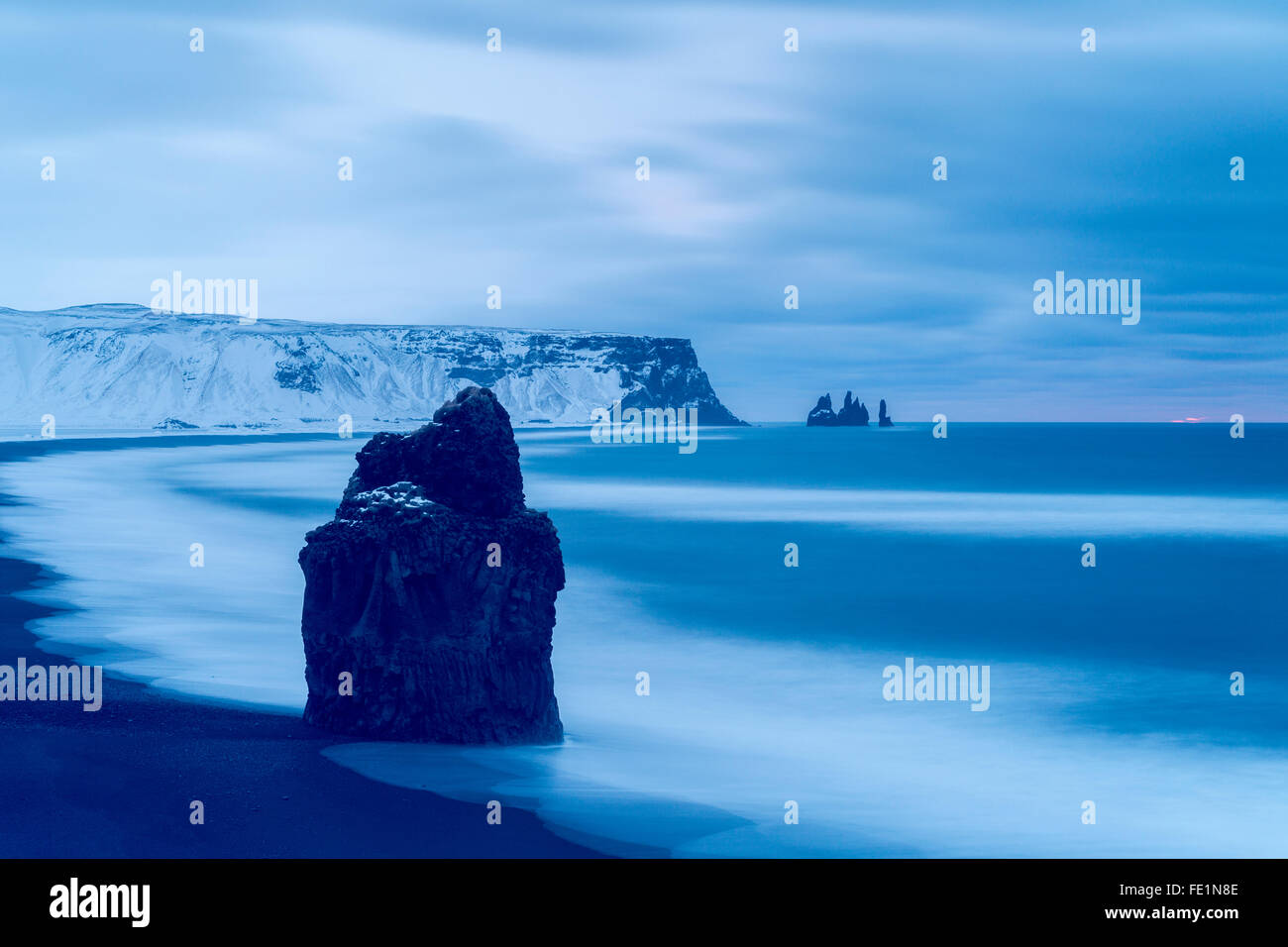 View to Mount Reynisfjall and Reynisdrangar Rocks, Iceland Stock Photo ...