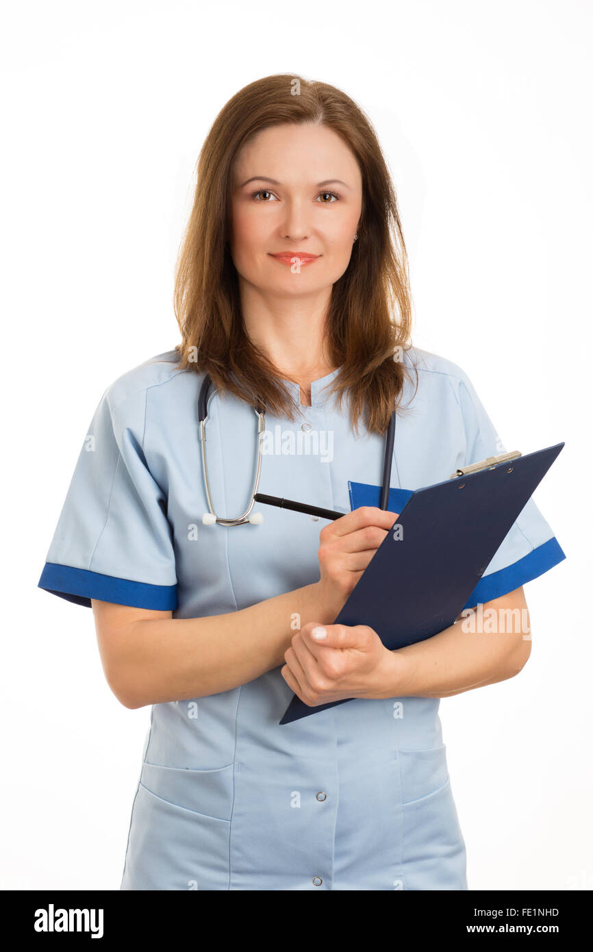 young female health care professional photographed against white ...