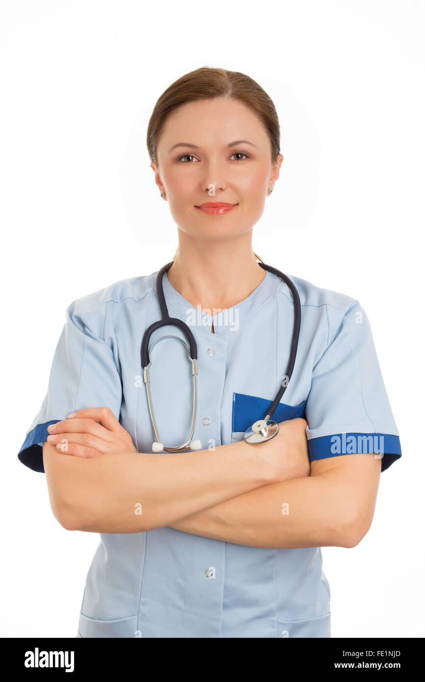 young female health care professional photographed against white ...