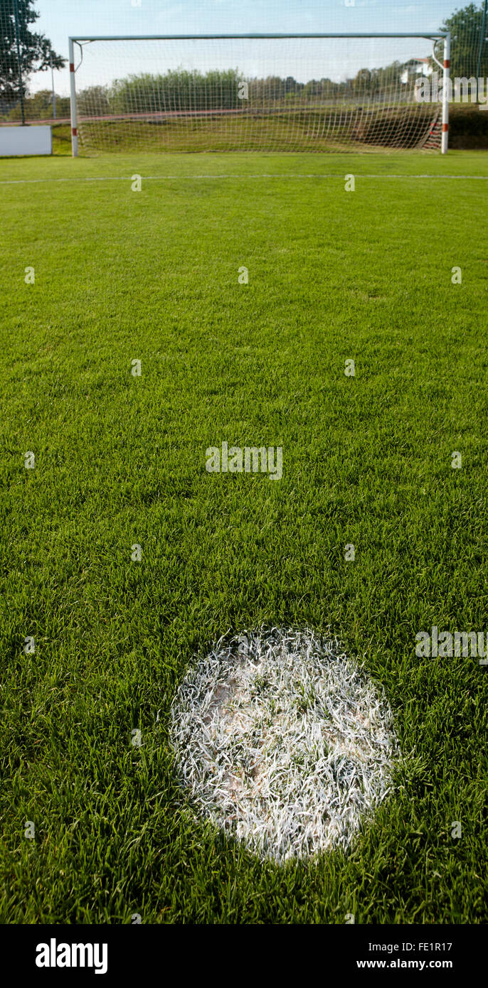Football field with penalty point. Vertical Stock Photo - Alamy