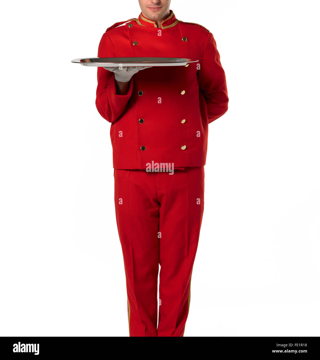 Bellboy with tray and red suit isolated on white Stock Photo - Alamy