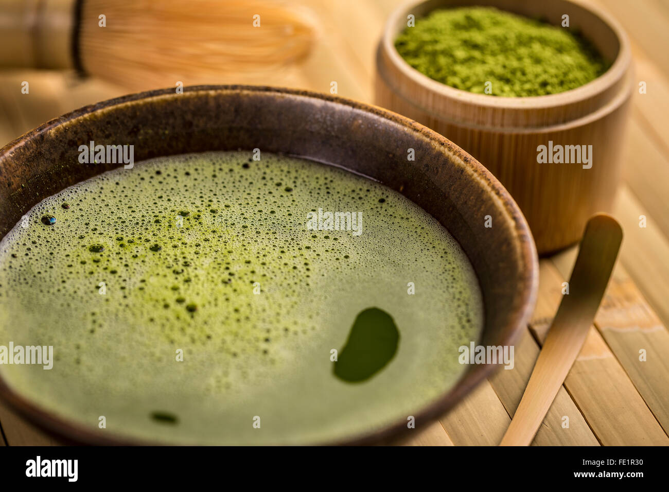 Matcha green tea in a matcha bowl Stock Photo - Alamy
