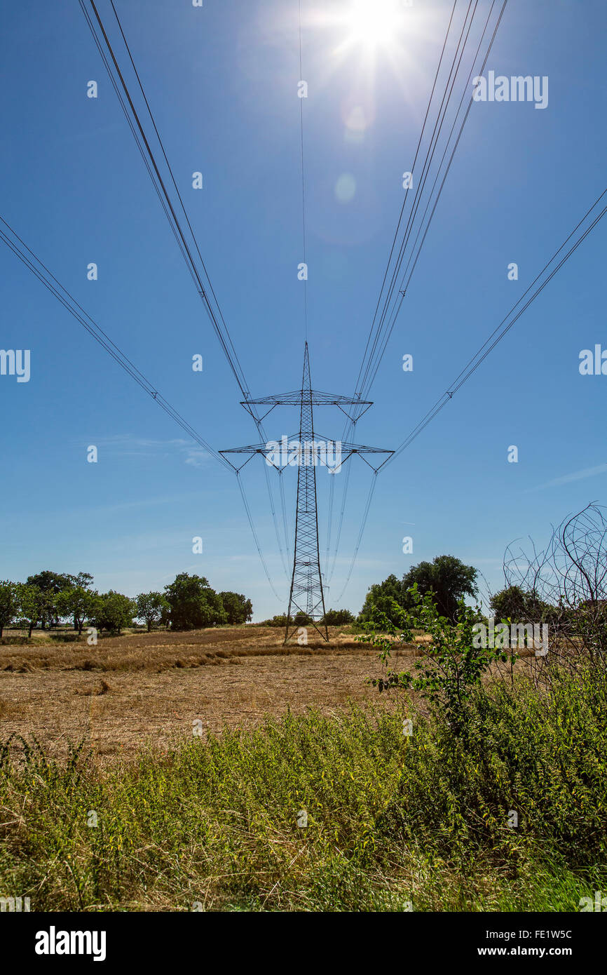 power tower with the sun in front Stock Photo - Alamy