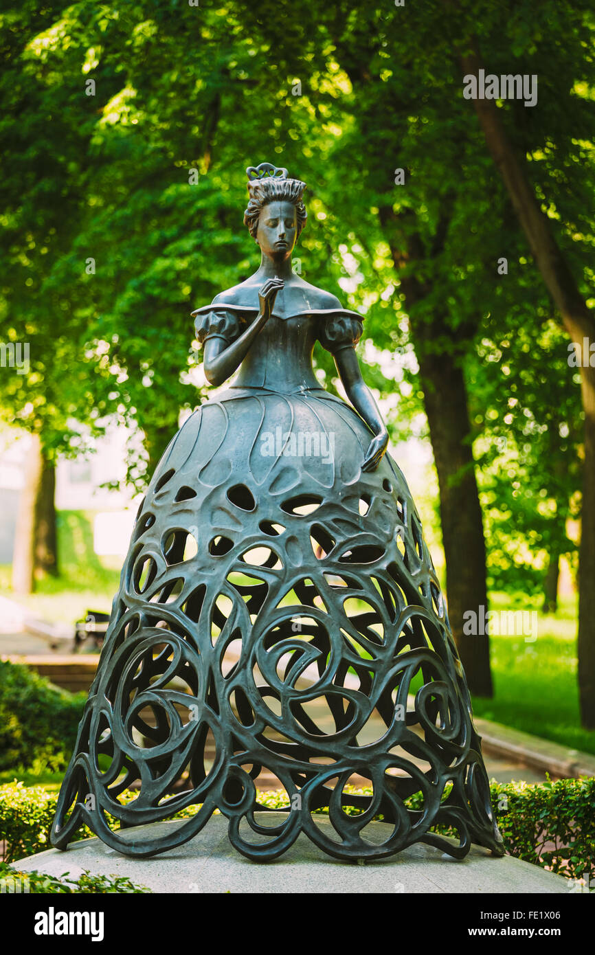 Sculpture of lady in openwork long dress "The Muse of opera" in park ...