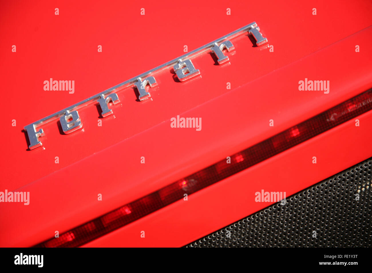 Engine cover and badge of red Ferrari sportscar Stock Photo - Alamy