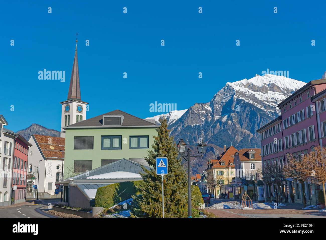 Catholic Church and Mountain in Bad Ragaz. Bad Ragaz is a city in ...