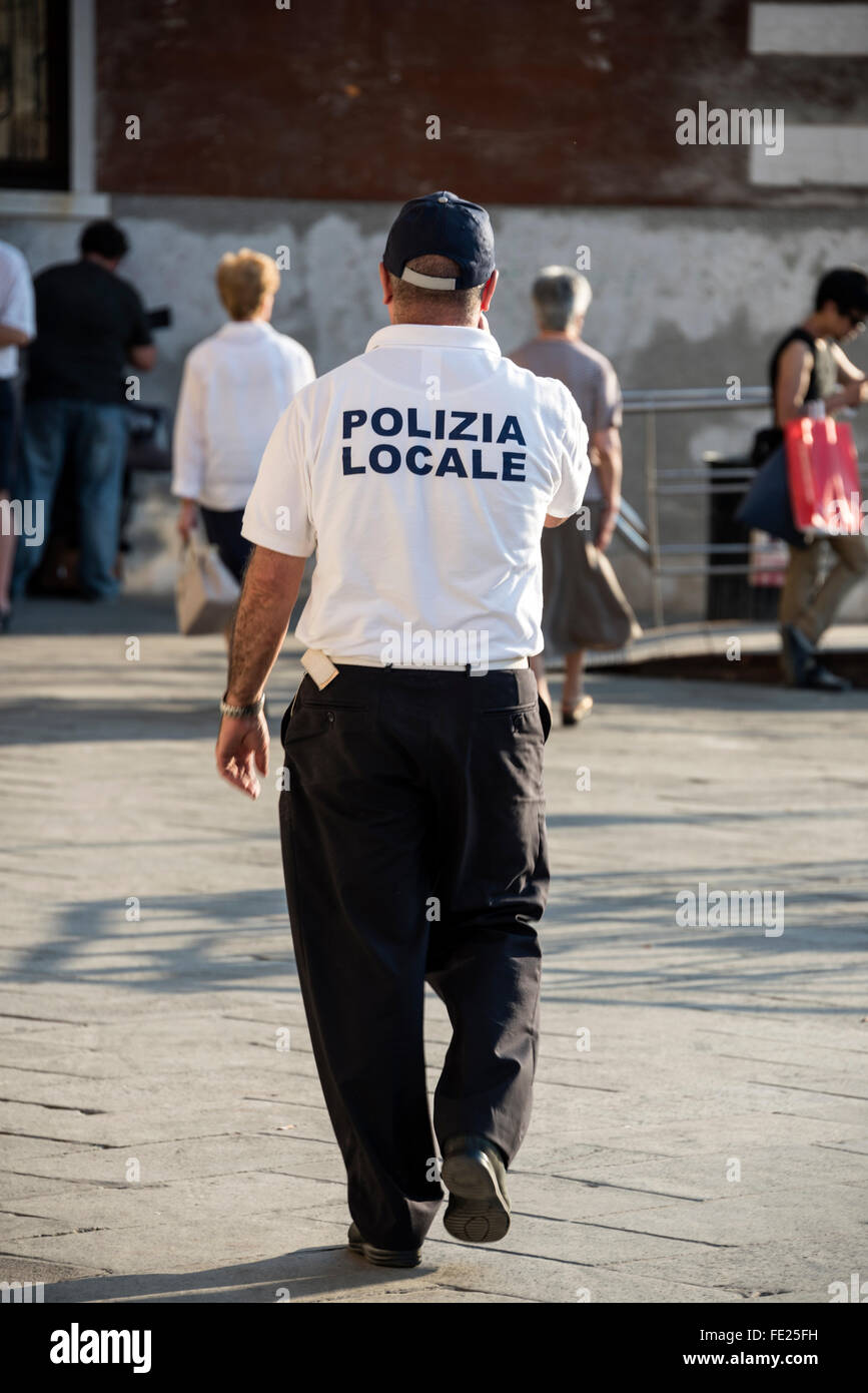 A local Policeman on duty on the streets of Venice in Italy Stock Photo ...