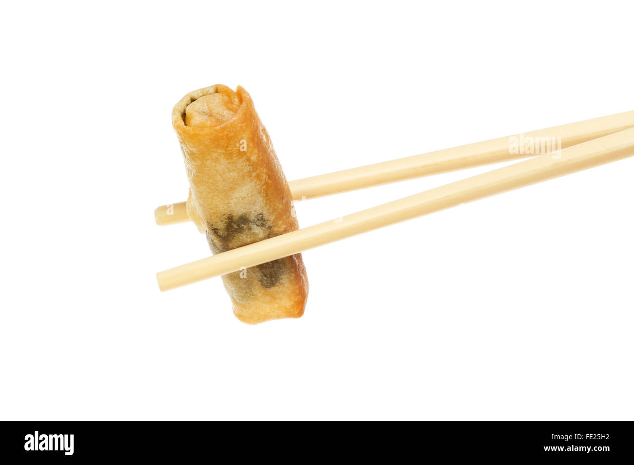 Spring roll held in chopsticks isolated against white Stock Photo - Alamy