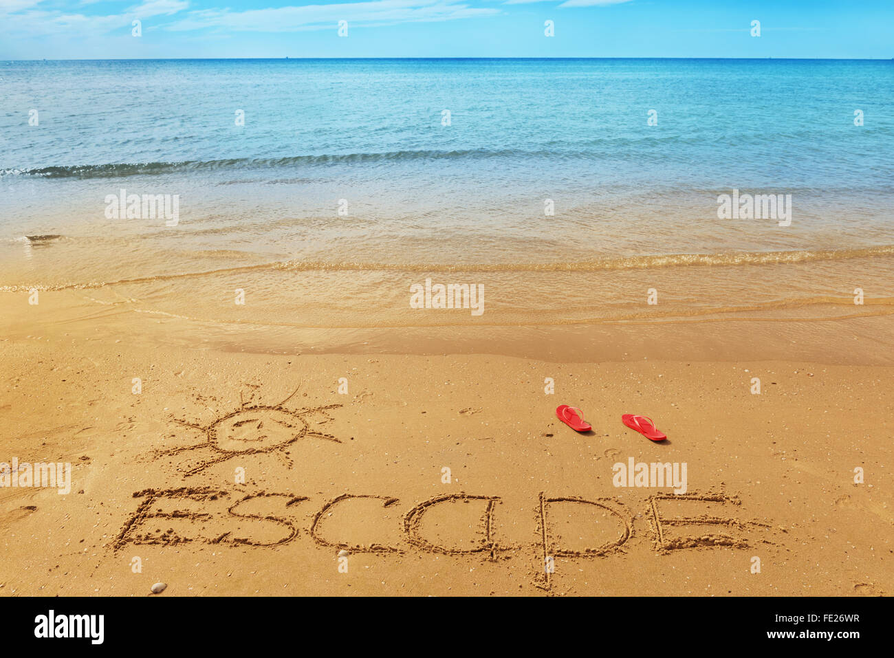 Escape message on the beach sand - vacation and travel concept Stock ...