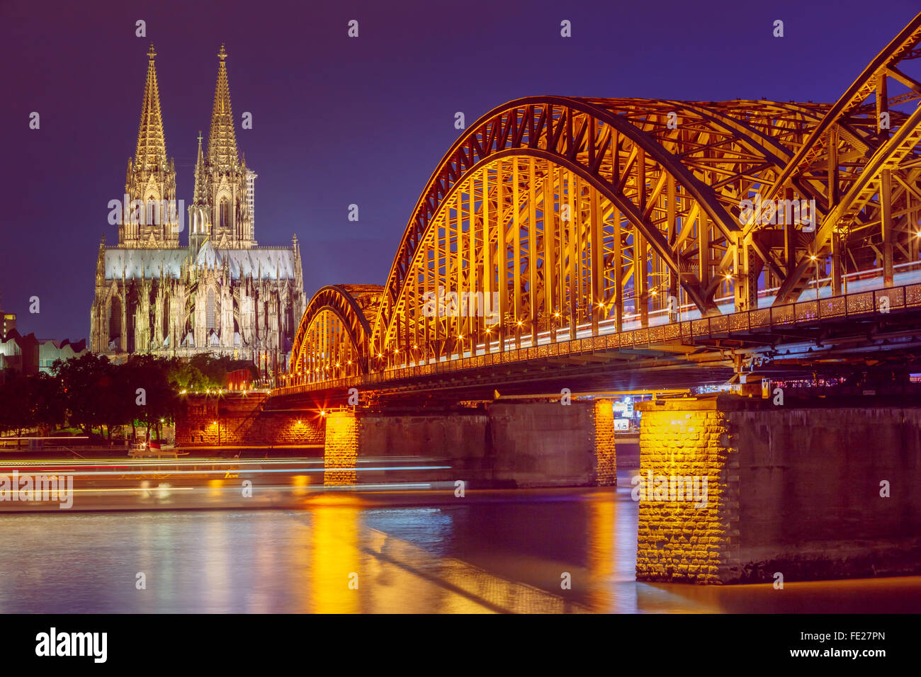 Night View Of Cologne Cathedral And Hohenzollern Bridge, Germany ...