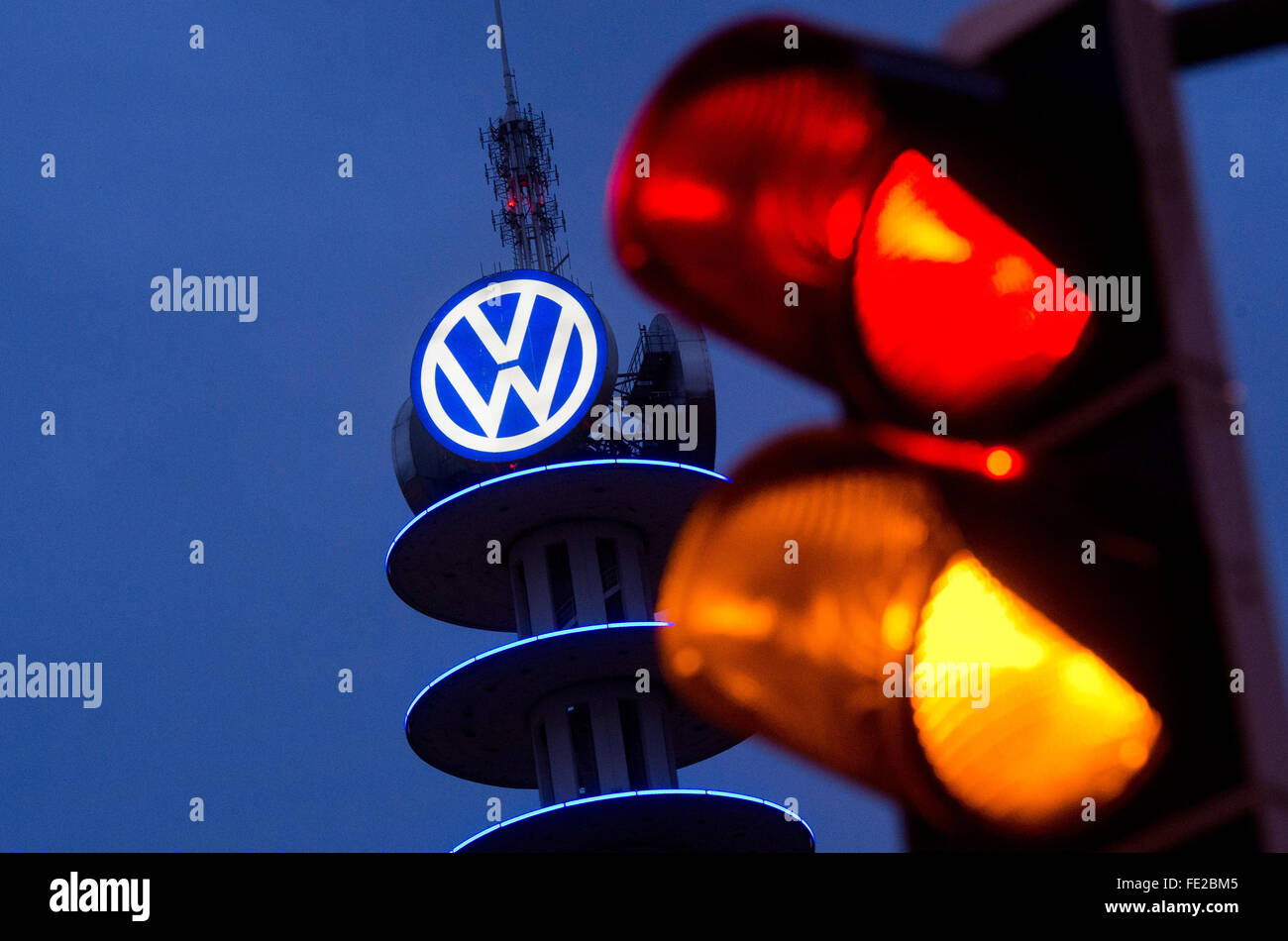 A large illuminated logo of German car manufacturer Volkswagen (VW ...