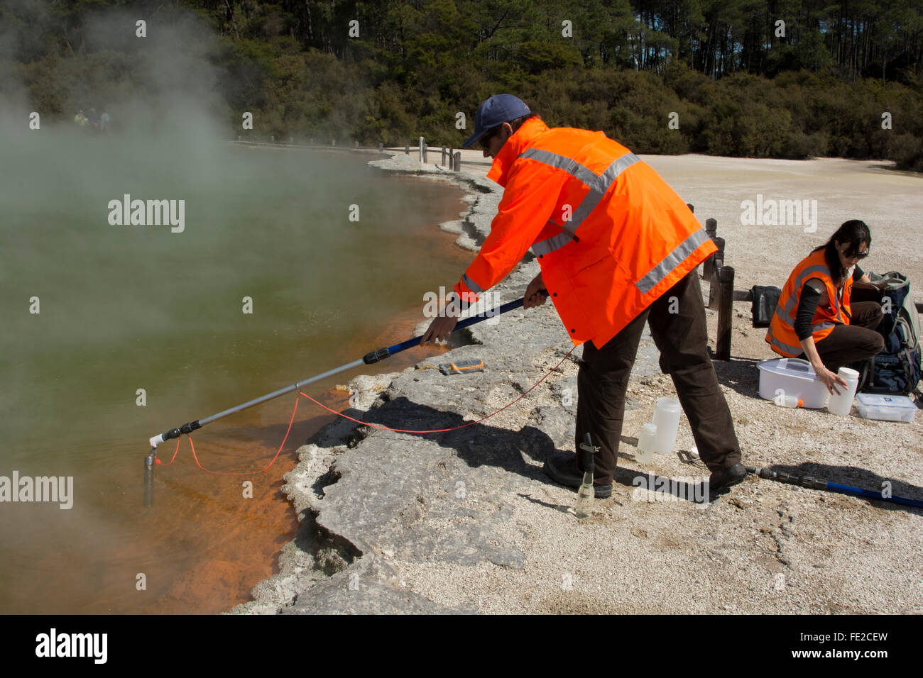 GNS scientists Matt Stott and Jean Power sampling microorganisms from ...